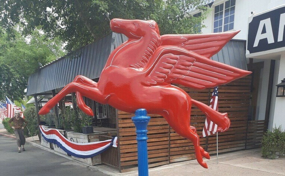 #M112 - Cast aluminum mobile pegasus Pole sign | MAG Auctions