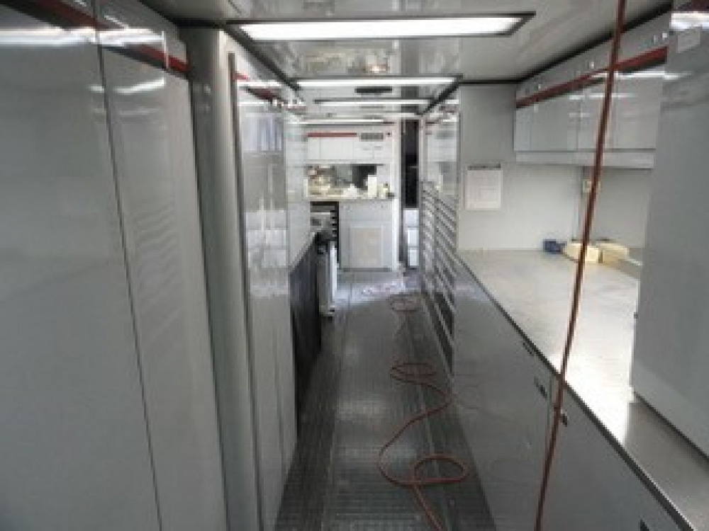 #582 - 2001 53 Foot Race GO Daddy Race team trailer | MAG Auctions
