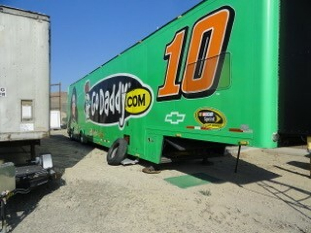 #582 - 2001 53 Foot Race GO Daddy Race team trailer | MAG Auctions