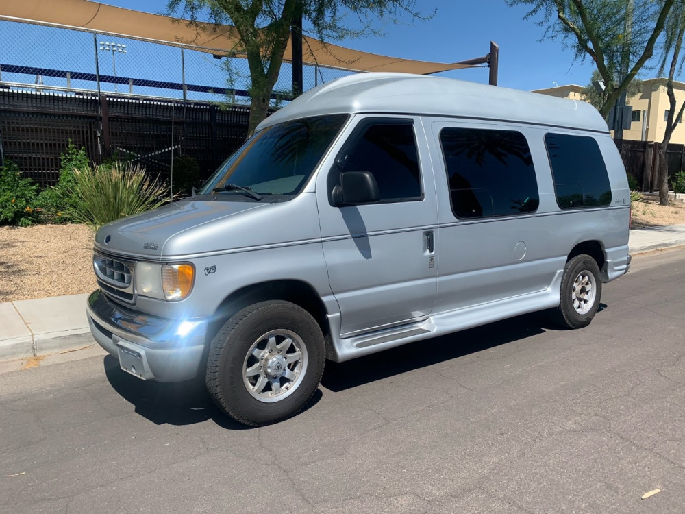 #338 - 2001 Ford High Top Conversion Van | MAG Auctions
