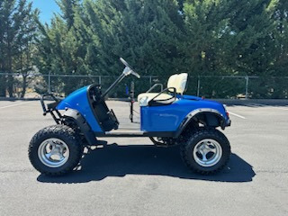 #302 - 2000 EZ Go custom build Golf Cart | MAG Auctions