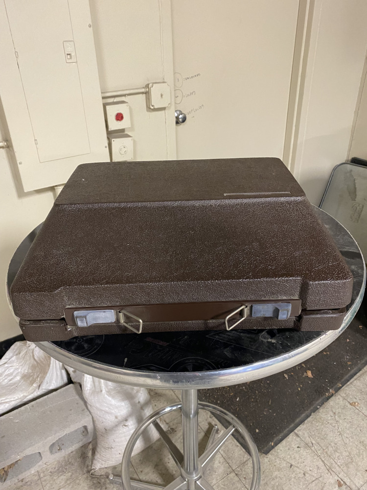 #M144 - Antique typewriter in case with paperwork | MAG Auctions