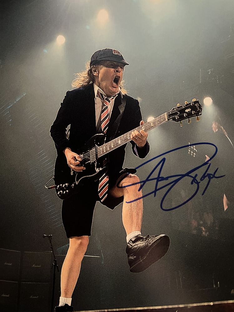 #M092 - AC/DC Angus Young signed photo. 8x10 inches | MAG Auctions