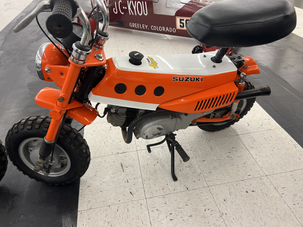 #303 - 1970 Suzuki Trail Hopper (Orange/White) | MAG Auctions