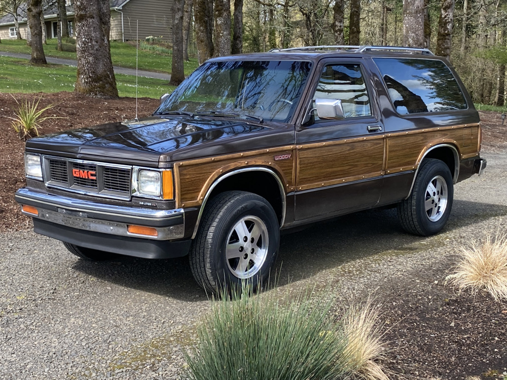 #327 - 1984 GMC S15 2-Door Woody | MAG Auctions