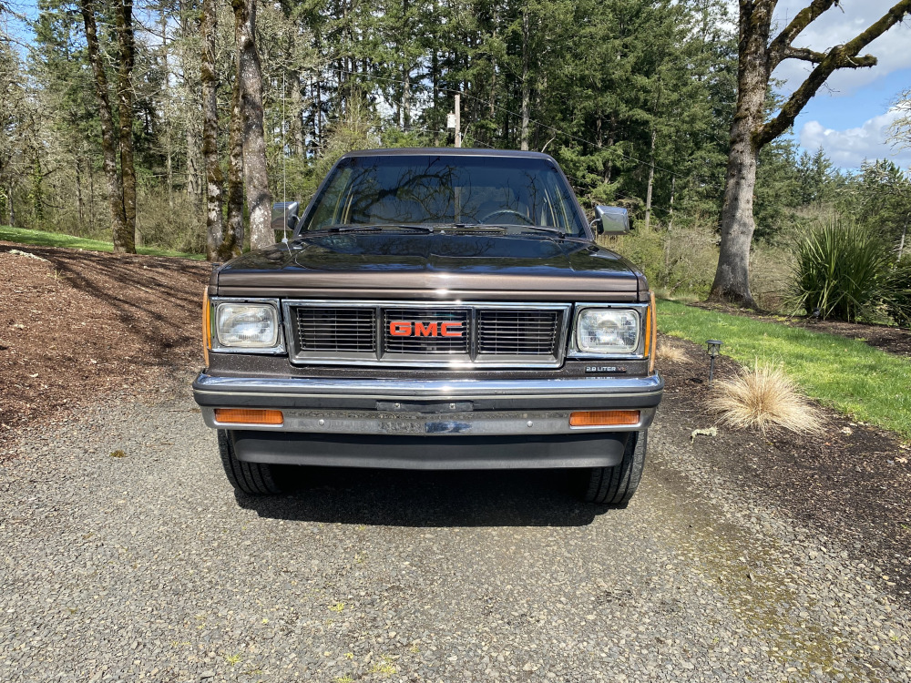 #327 - 1984 GMC S15 2-Door Woody | MAG Auctions