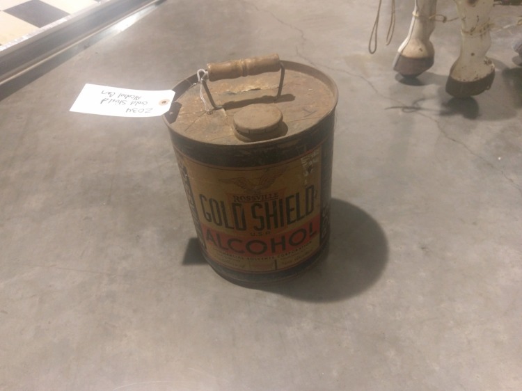 #Z034 - Gold Shield Alcohol Can | MAG Auctions