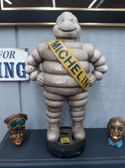 #Z036 - Larger Cast Iron Vintage Michelin Statue | MAG Auctions